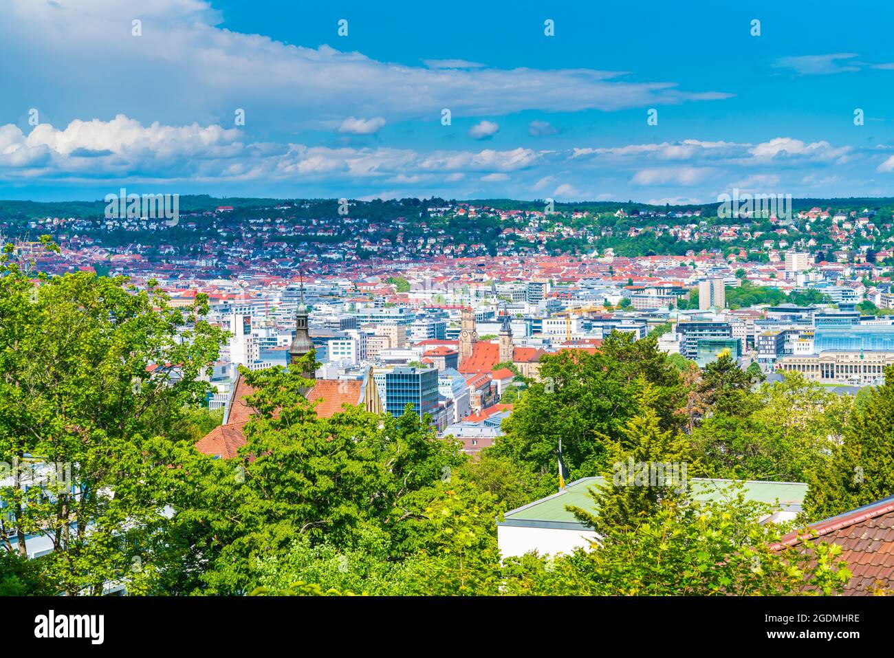 Germany, Downtown stuttgart houses and churches seen from above green ...