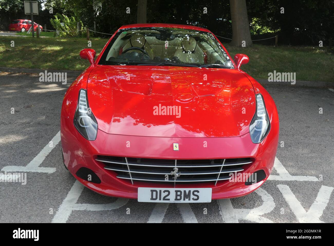 Red Ferrari sports car Stock Photo - Alamy