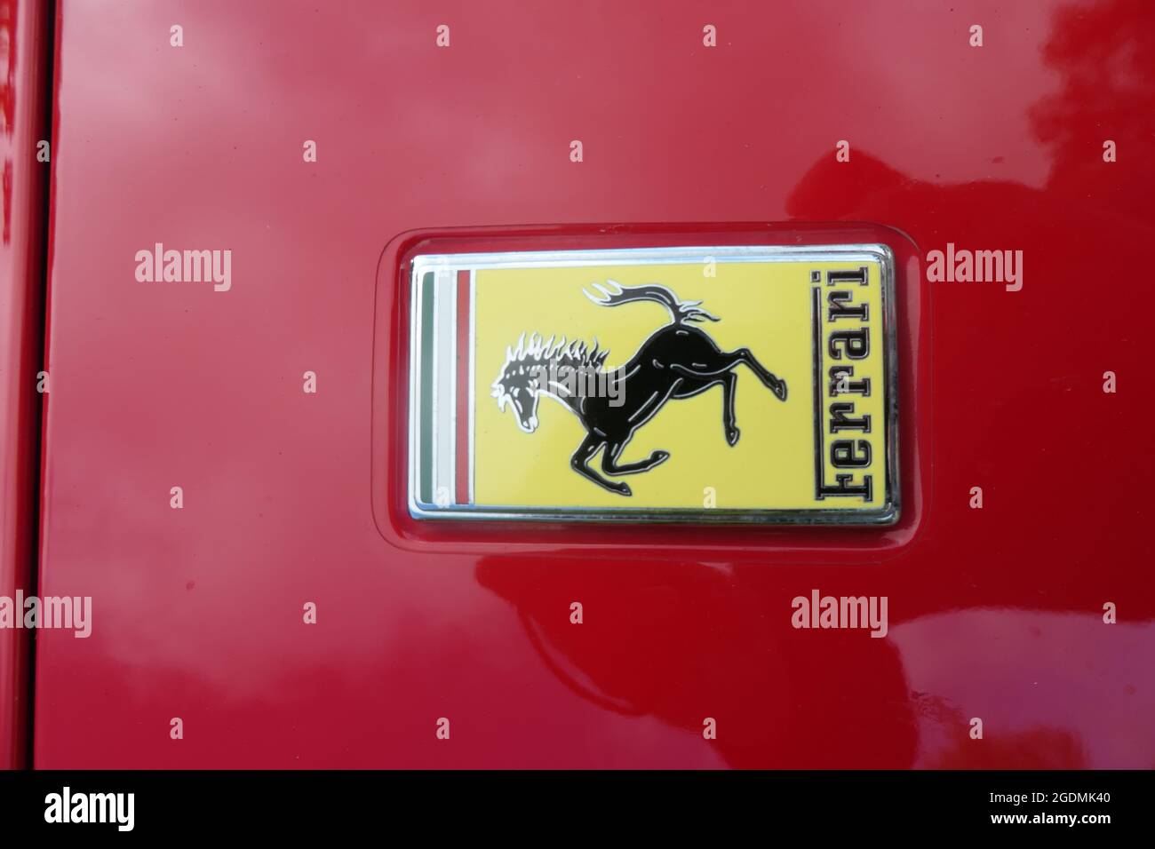 Red Ferrari sports car badge Stock Photo - Alamy