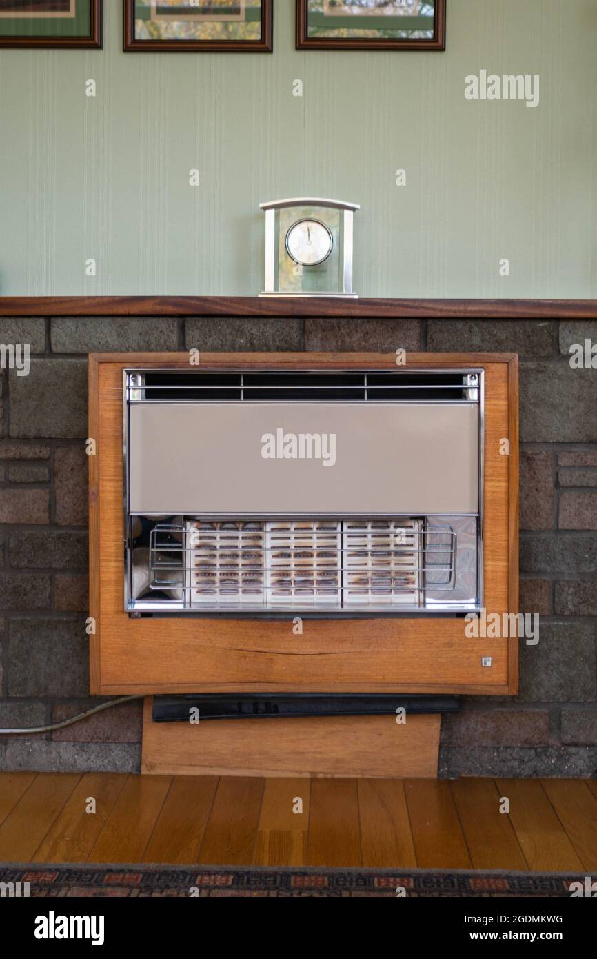 1980's traditional wood surround gas fire built into stone fireplace ...