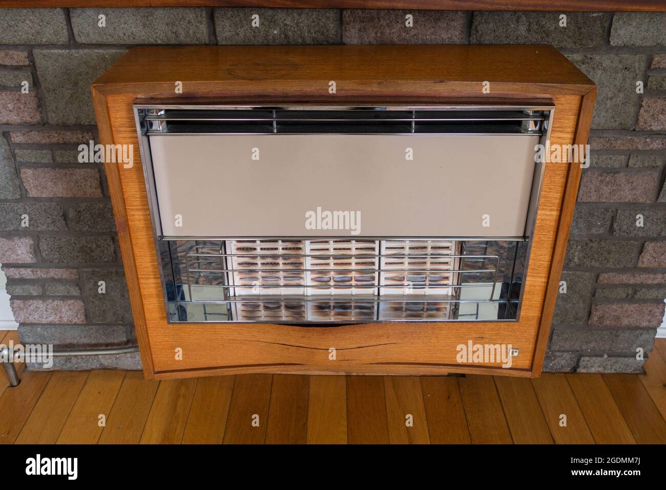 1980's traditional wood surround gas fire built into stone fireplace ...