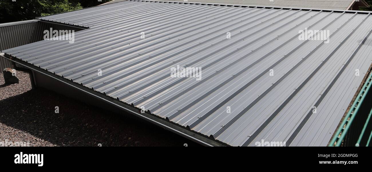 a roof with gray trapezoidal sheet metal Stock Photo - Alamy