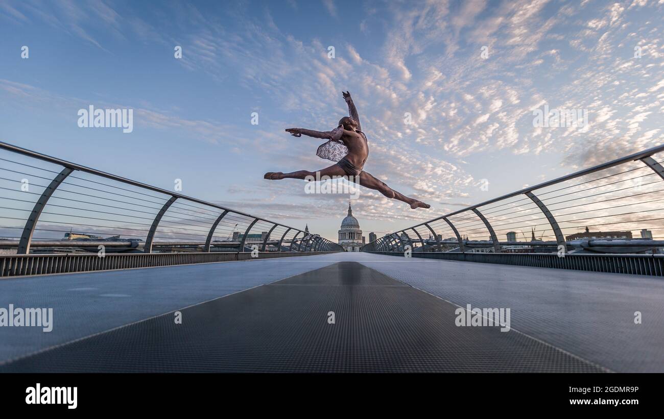 A ballet dancer on Millennium Bridge in London at sunrise Stock Photo ...