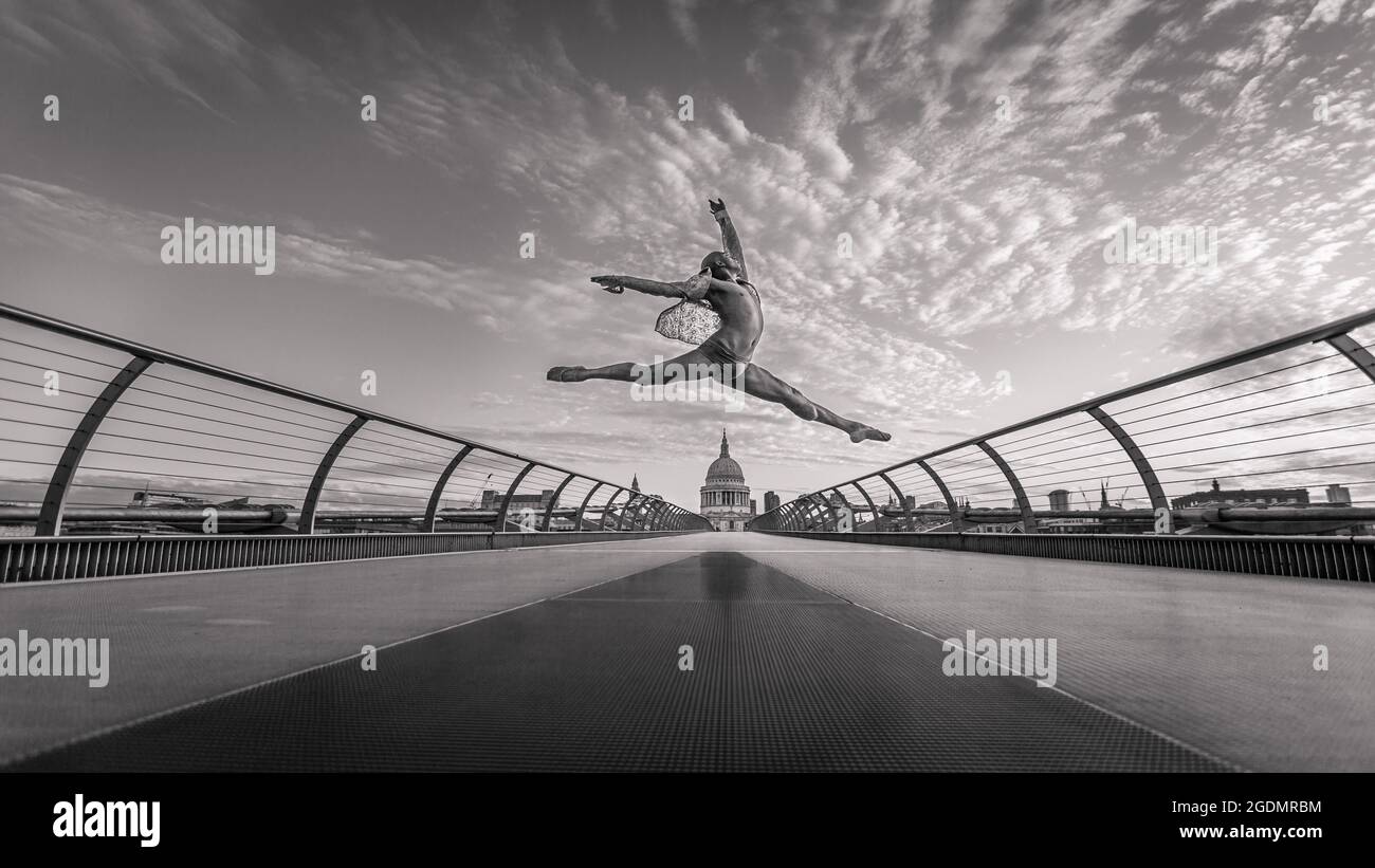 A black and white image of a ballet dancer on Millennium Bridge in ...