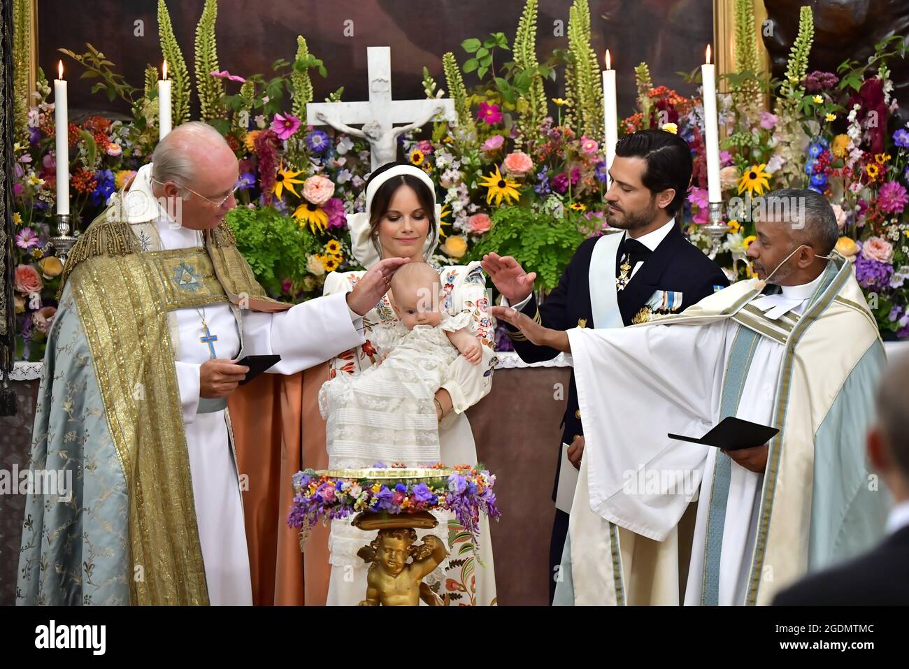 STOCKHOLM 20210814 Bishop Johan Dalman, Princess Sofia holding Prince ...