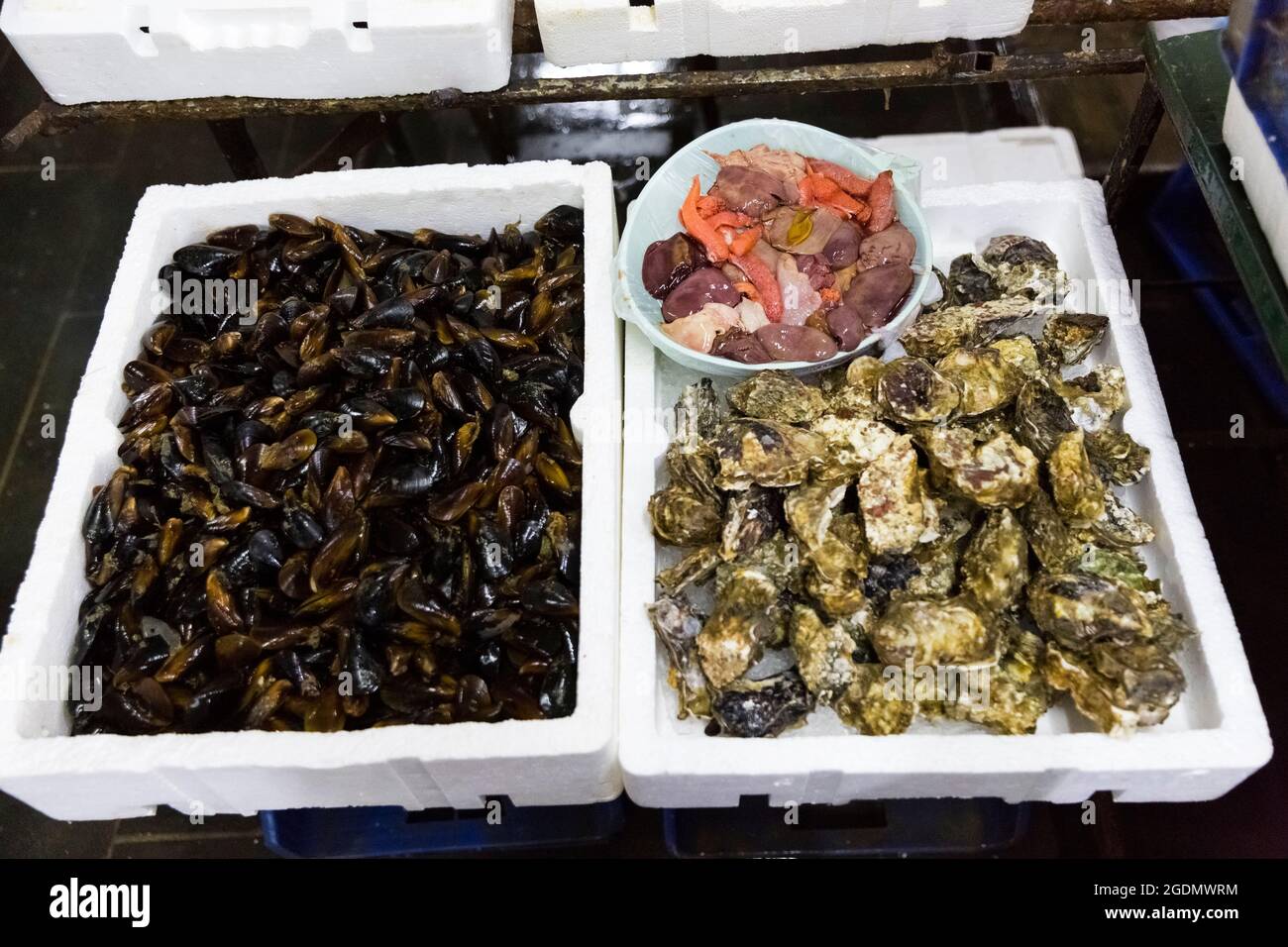 Fresh seafood market in Batumi Georgia. Live fish in ice. Flounder, red ...