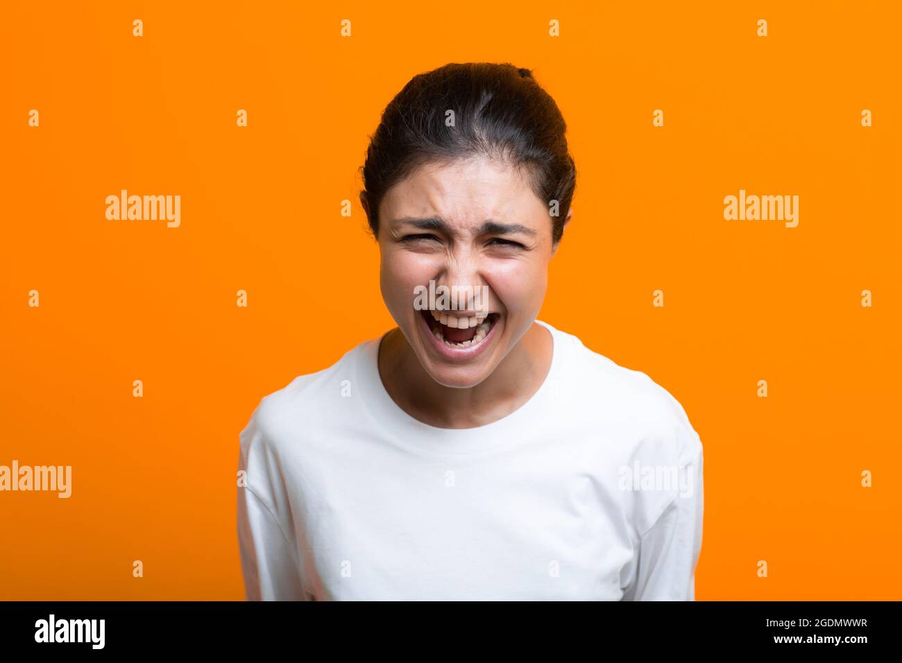 Portrait of yelling shouts angry sad young adult indian woman Stock ...