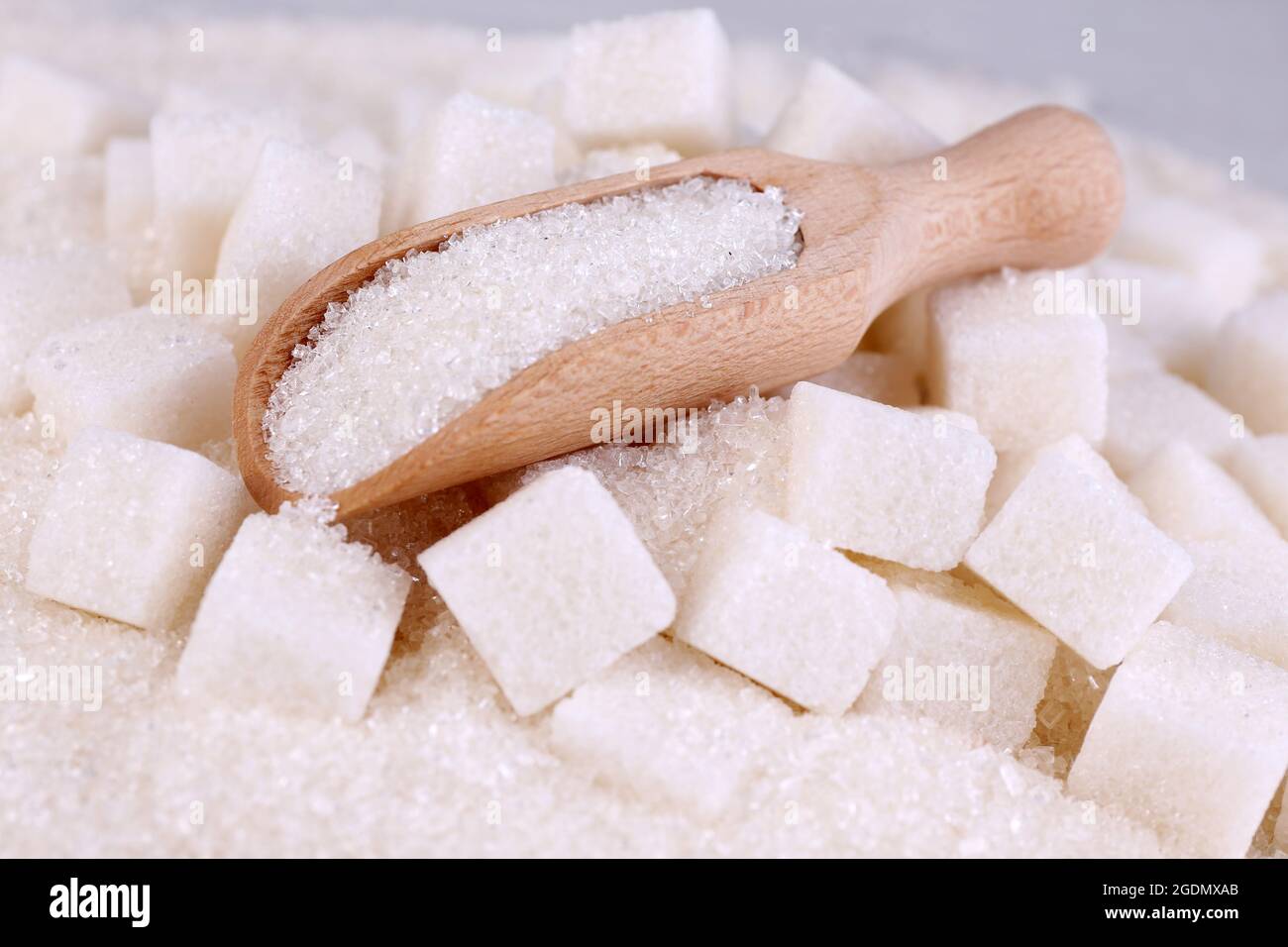 White sugar in light background background Stock Photo - Alamy