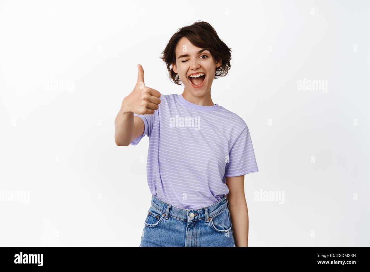 Woman Winking Thumbs Up High Resolution Stock Photography and Images ...