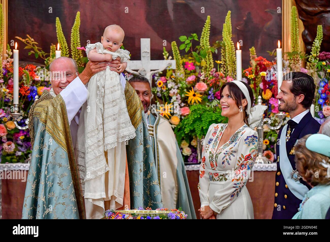 STOCKHOLM 20210814 Bishop Johan Dalman holding Prince Julian, Princess ...