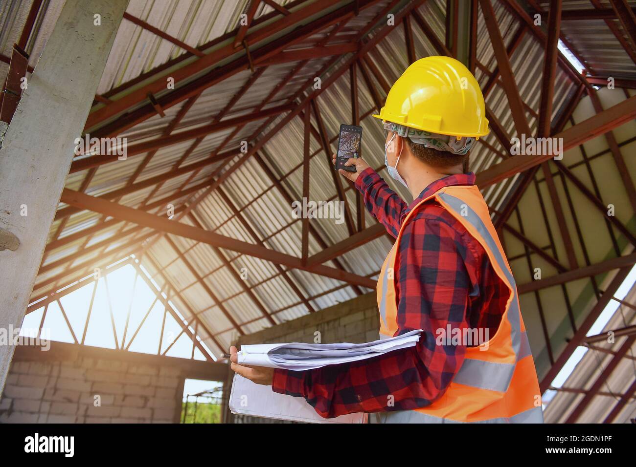 Asian man civil engineer architect wearing safety helmet meeting at ...