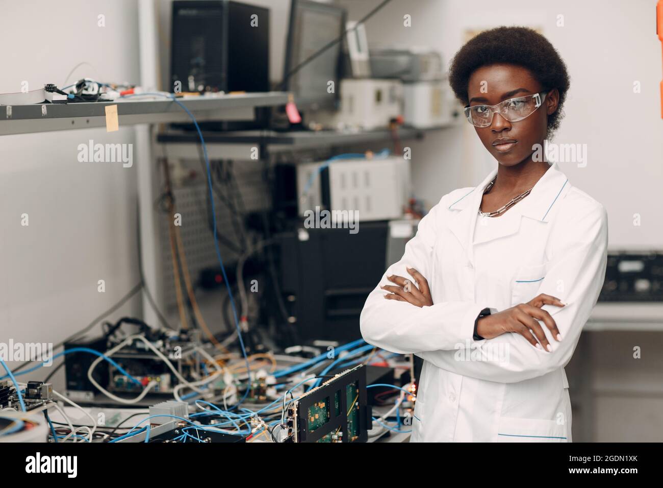 Scientist african american woman standing and looking at camera in ...