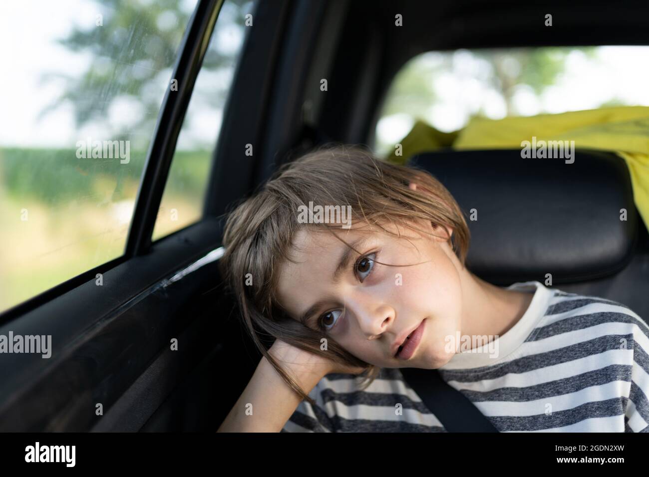 A young boy taking a car ride Stock Photo - Alamy