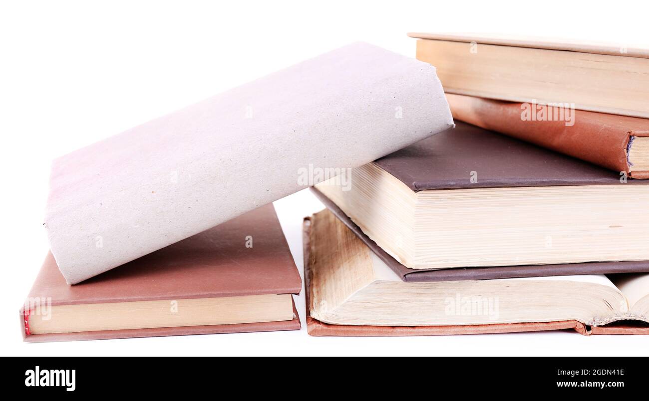 Books in a mess isolated on white Stock Photo - Alamy