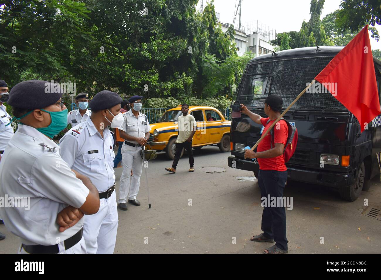 Kolkata, India. 14th Aug, 2021. A protester taking selfie in front of ...