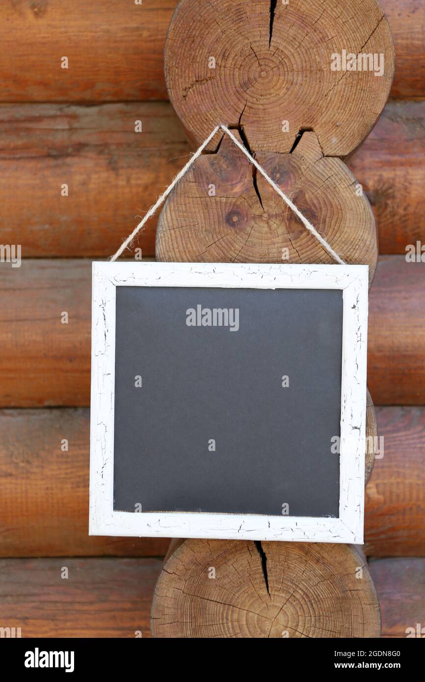 Signboard hanging on wooden fence Stock Photo - Alamy