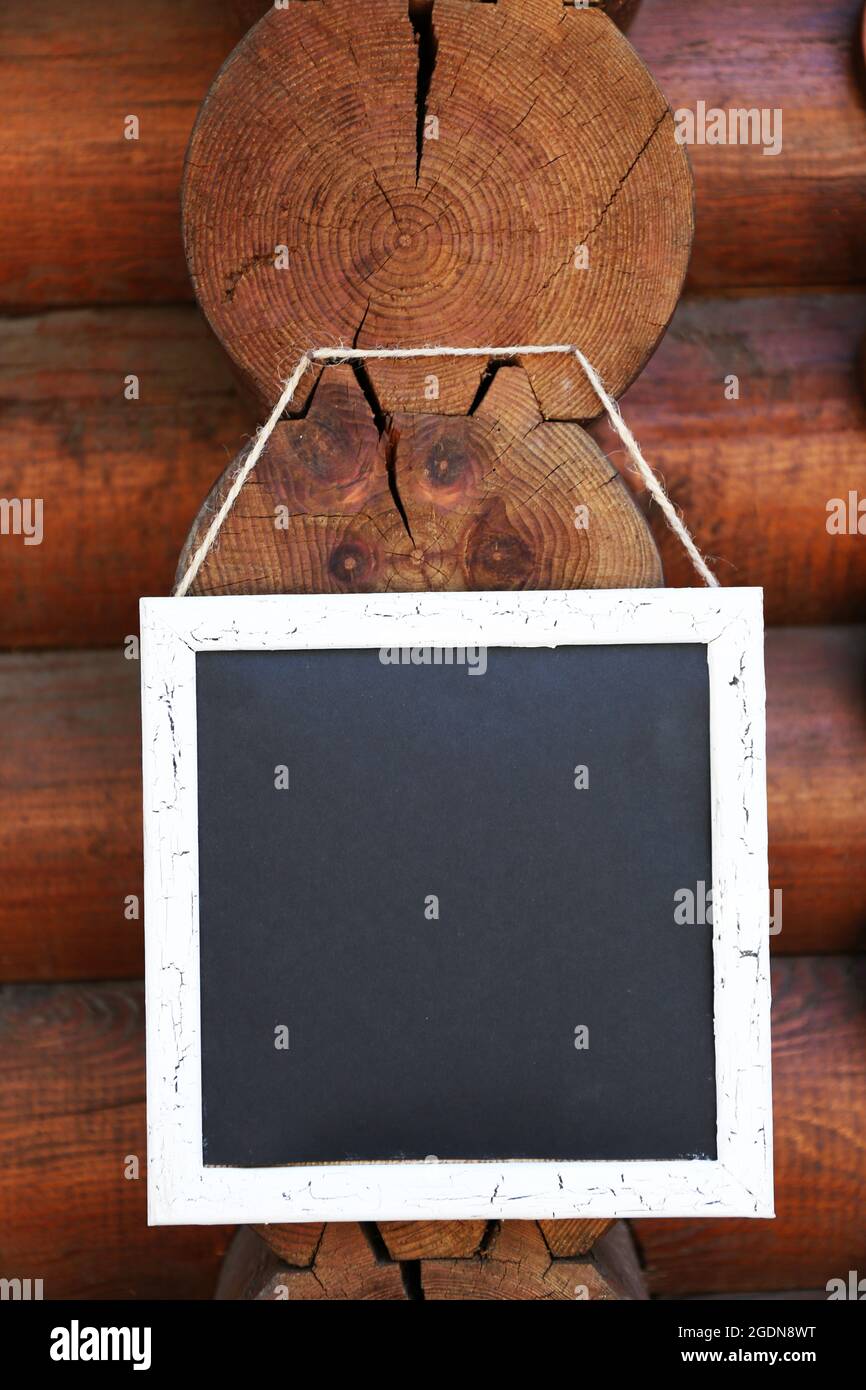 Signboard hanging on wooden fence Stock Photo - Alamy