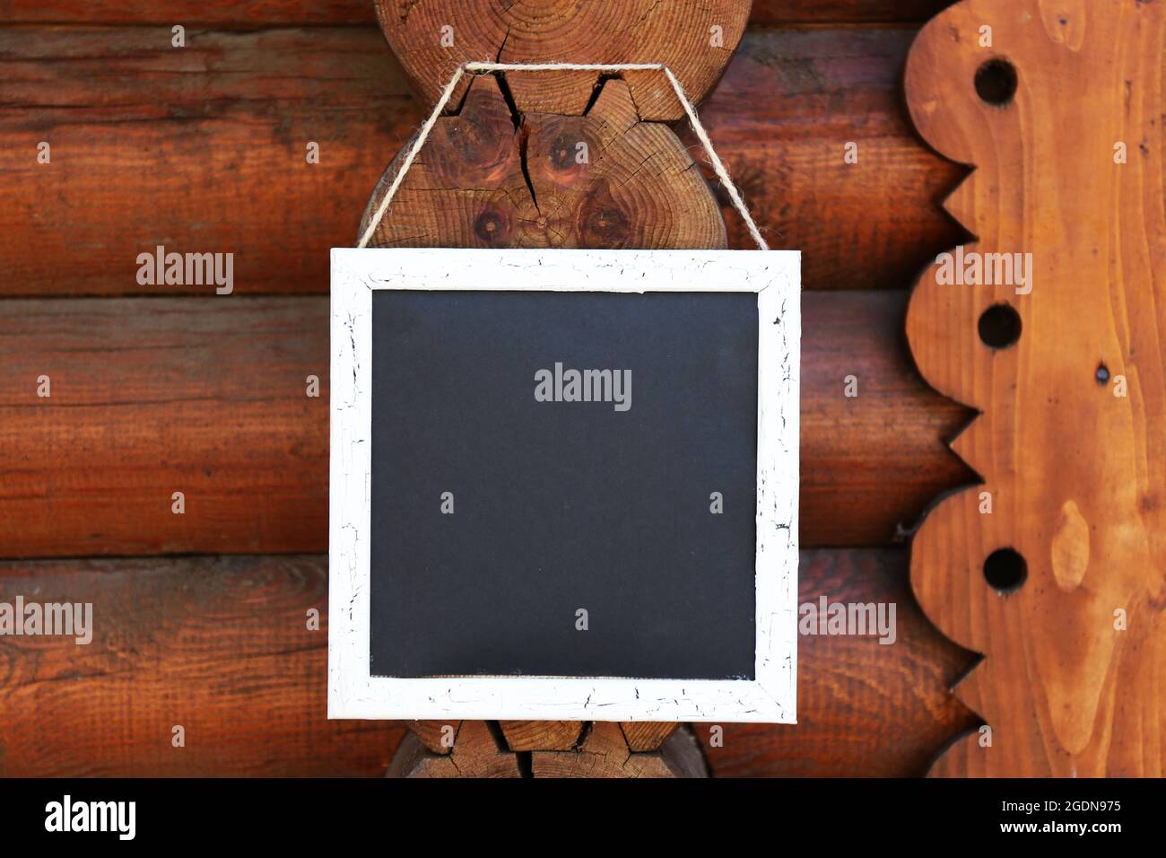 Signboard hanging on wooden fence Stock Photo - Alamy