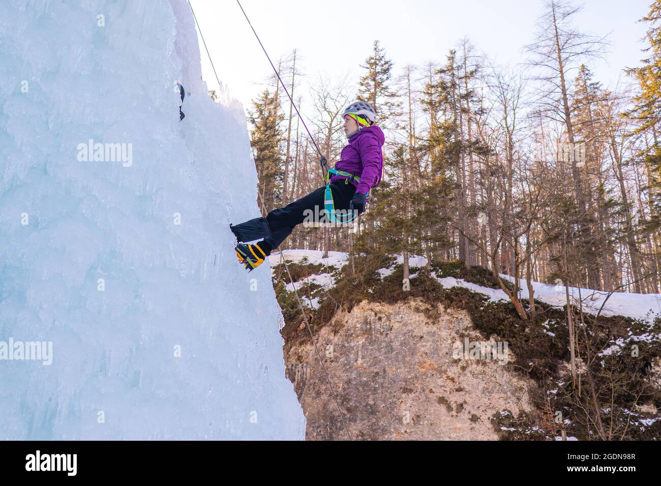 Female climber using climbing equipment hi-res stock photography and ...