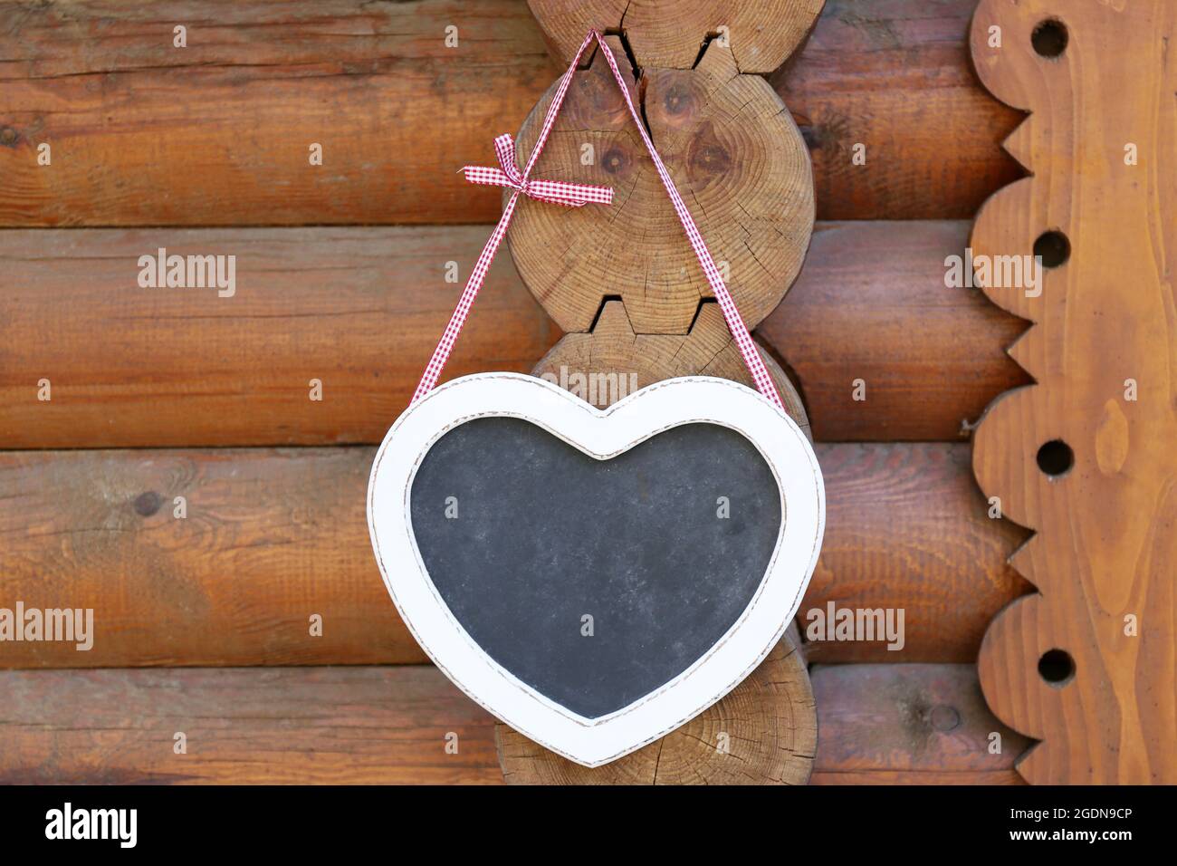 Signboard hanging on wooden fence Stock Photo - Alamy