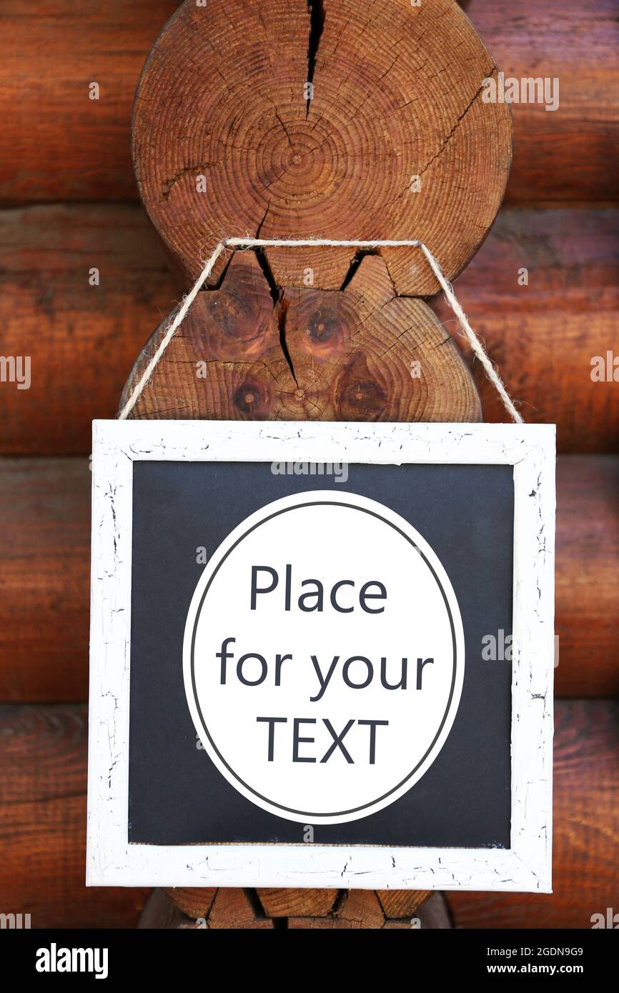 Signboard hanging on wooden fence Stock Photo - Alamy