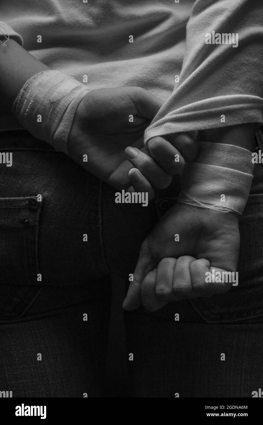 Hand cutting bandage Black and White Stock Photos & Images - Alamy