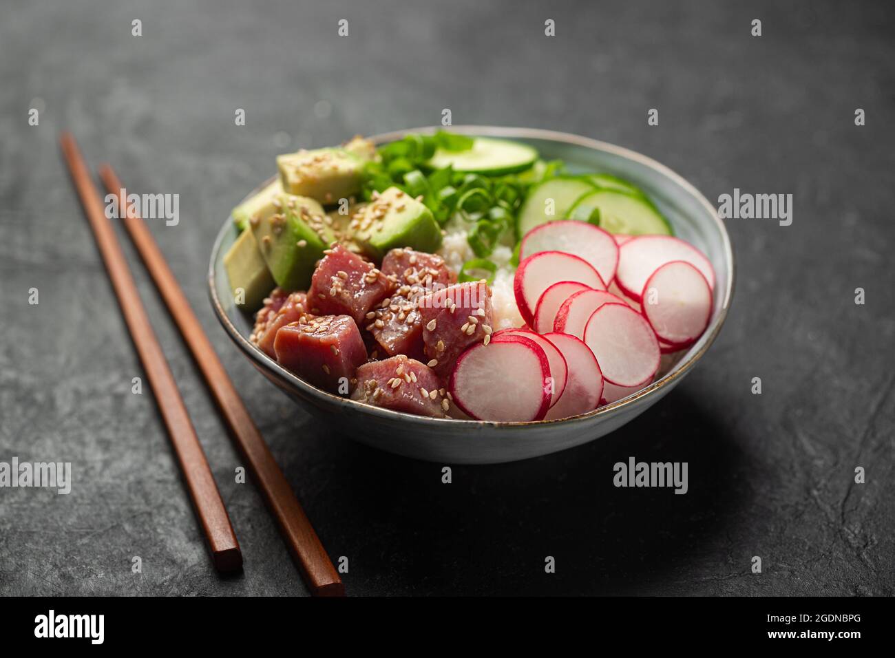 Traditional Hawaiian Poke Bowl prepared with Tuna Fish, rice and ...