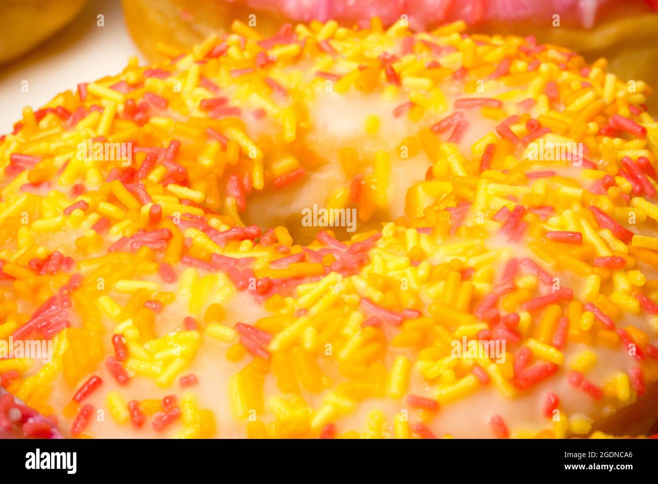 Iced Ring Donuts On A White Background Stock Photo - Alamy