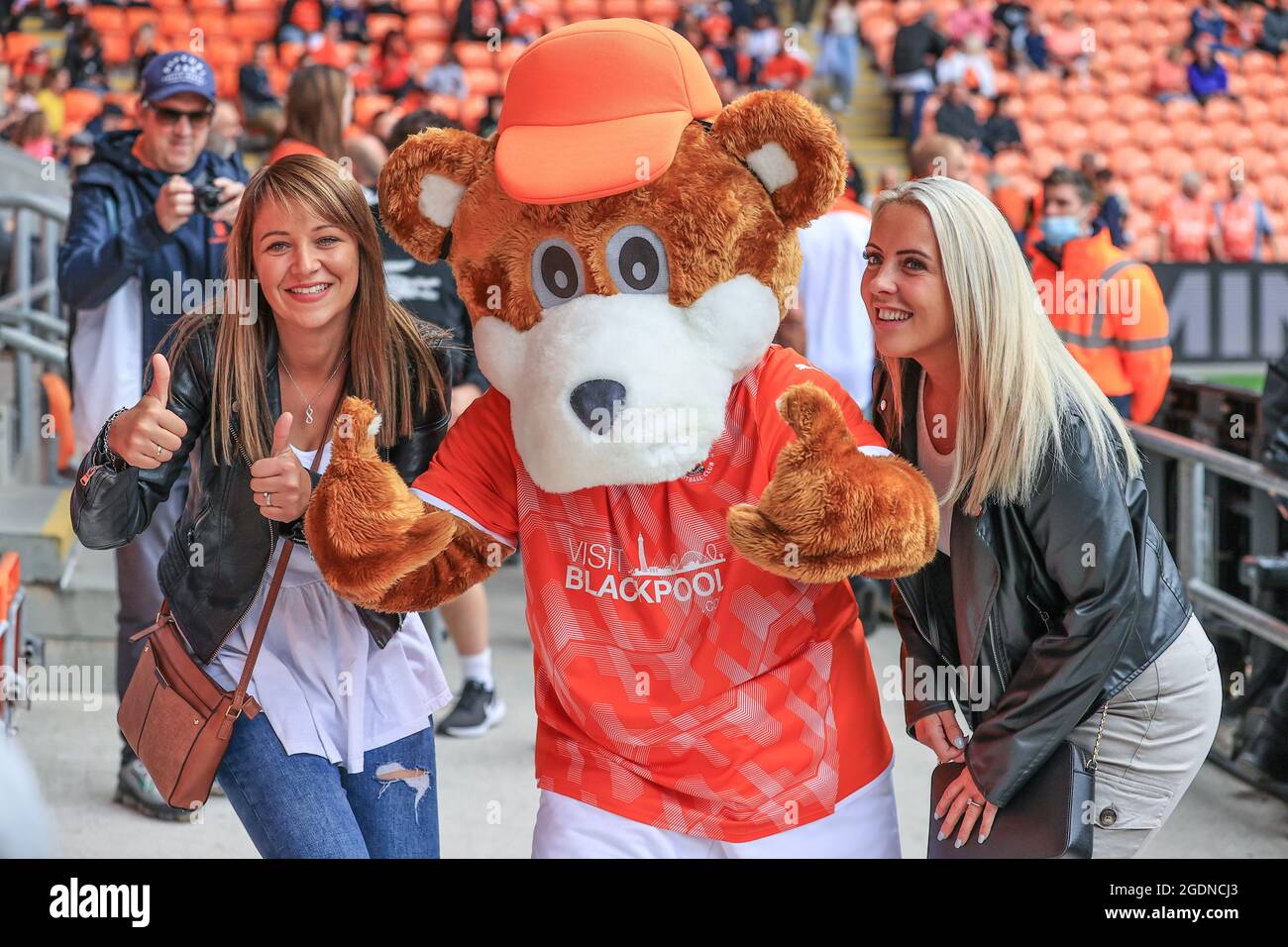 Fans have their picture taken with Bloomfield Bear, Blackpool’s club ...
