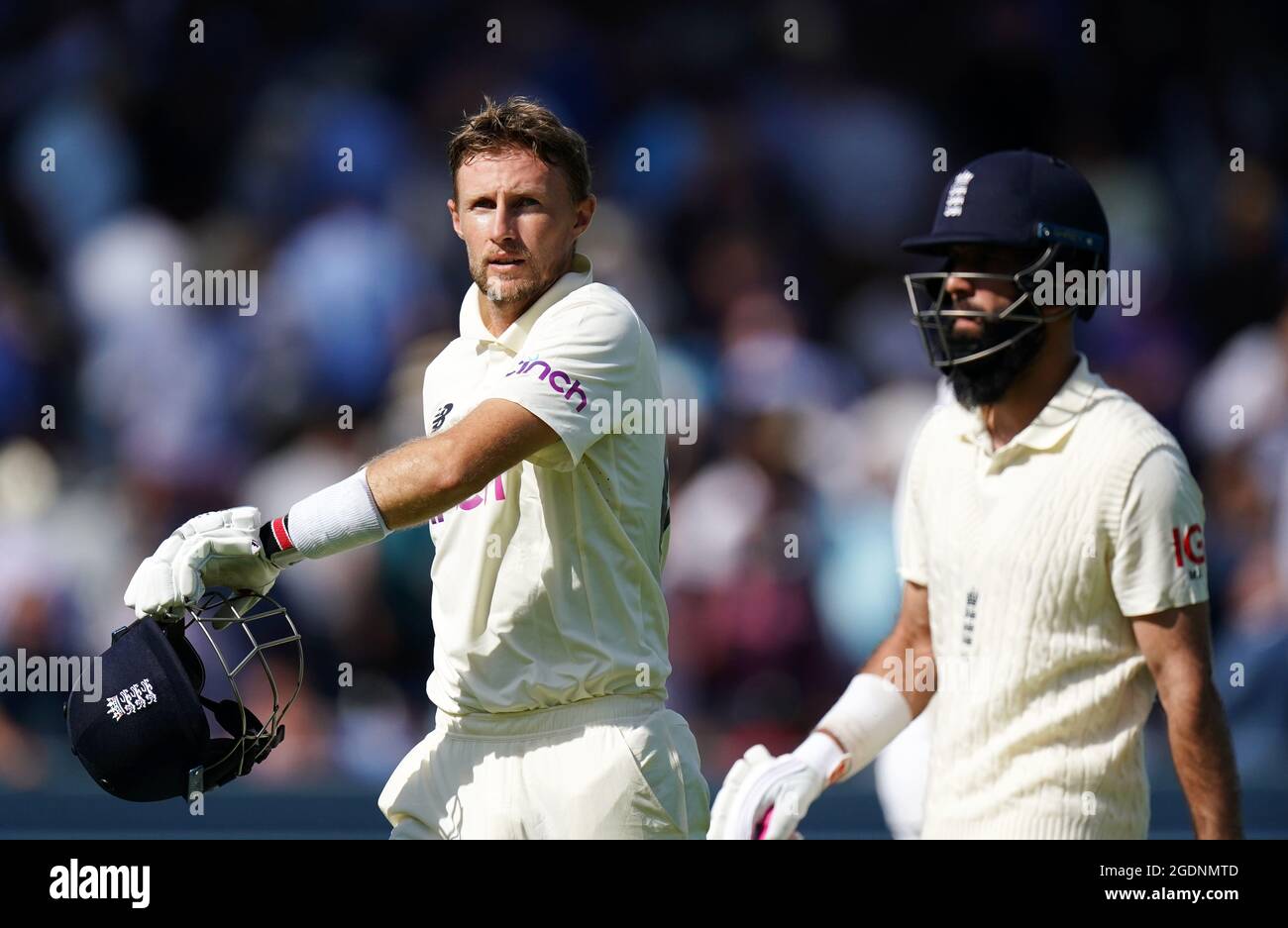 England's Joe Root (left) and Moeen Ali during day three of the cinch ...