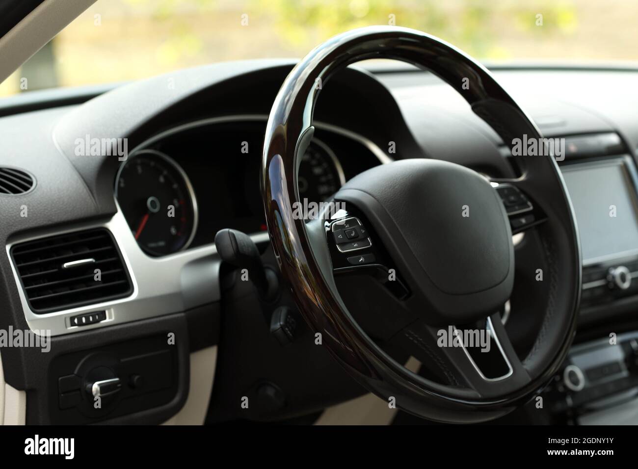 Modern car interior. Steering wheel, close-up Stock Photo - Alamy