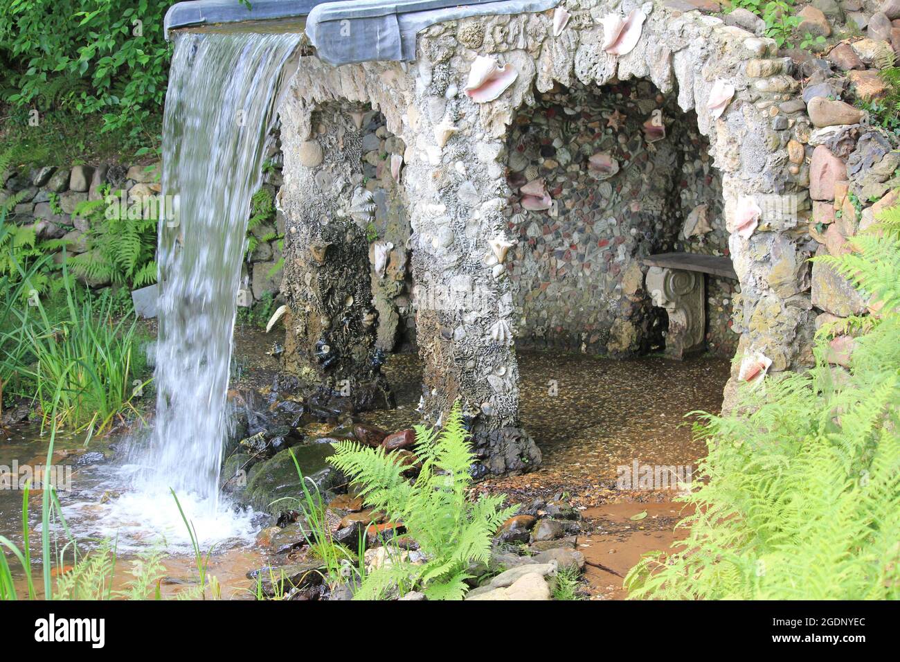 Shell-cave with waterfall Stock Photo - Alamy