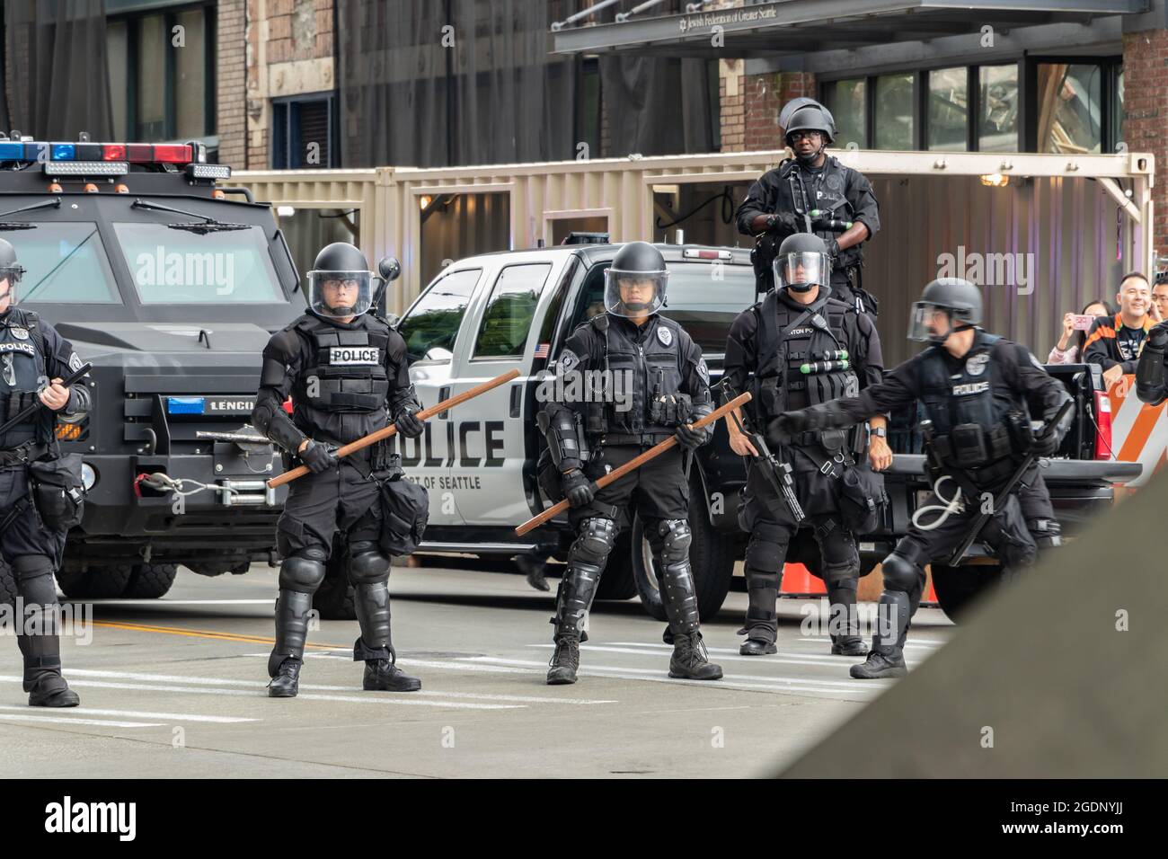 armed anti riot police stand ready for action at BLM and Anti Trump ...