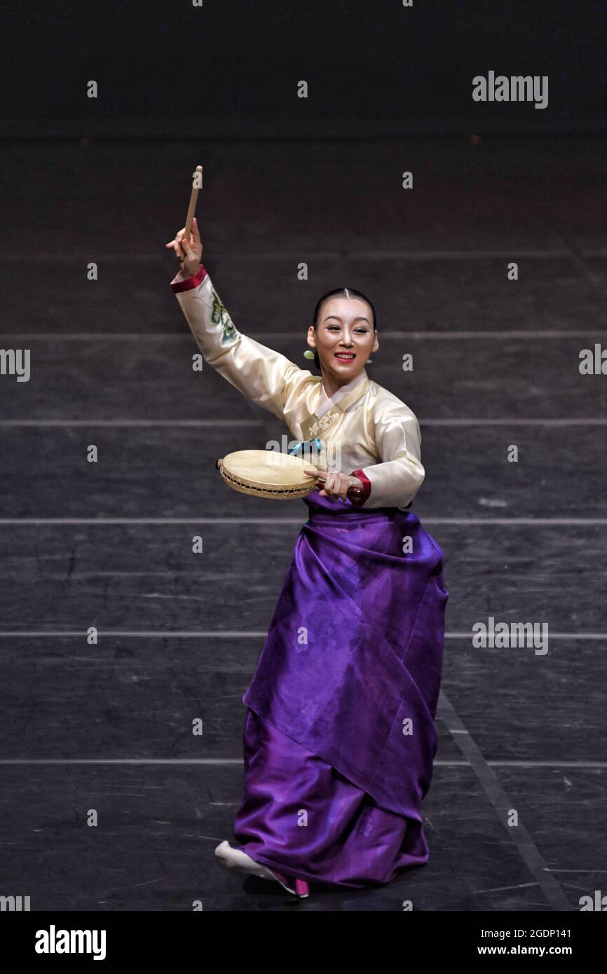 BUSAN, KOREA, SOUTH - Jun 26, 2019: A dancer in a costume performing on ...