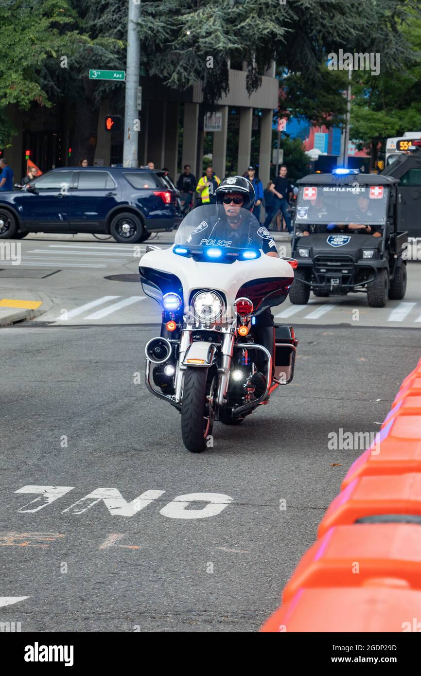police motorcycle and cop at BLM and Anti Trump protest march in ...
