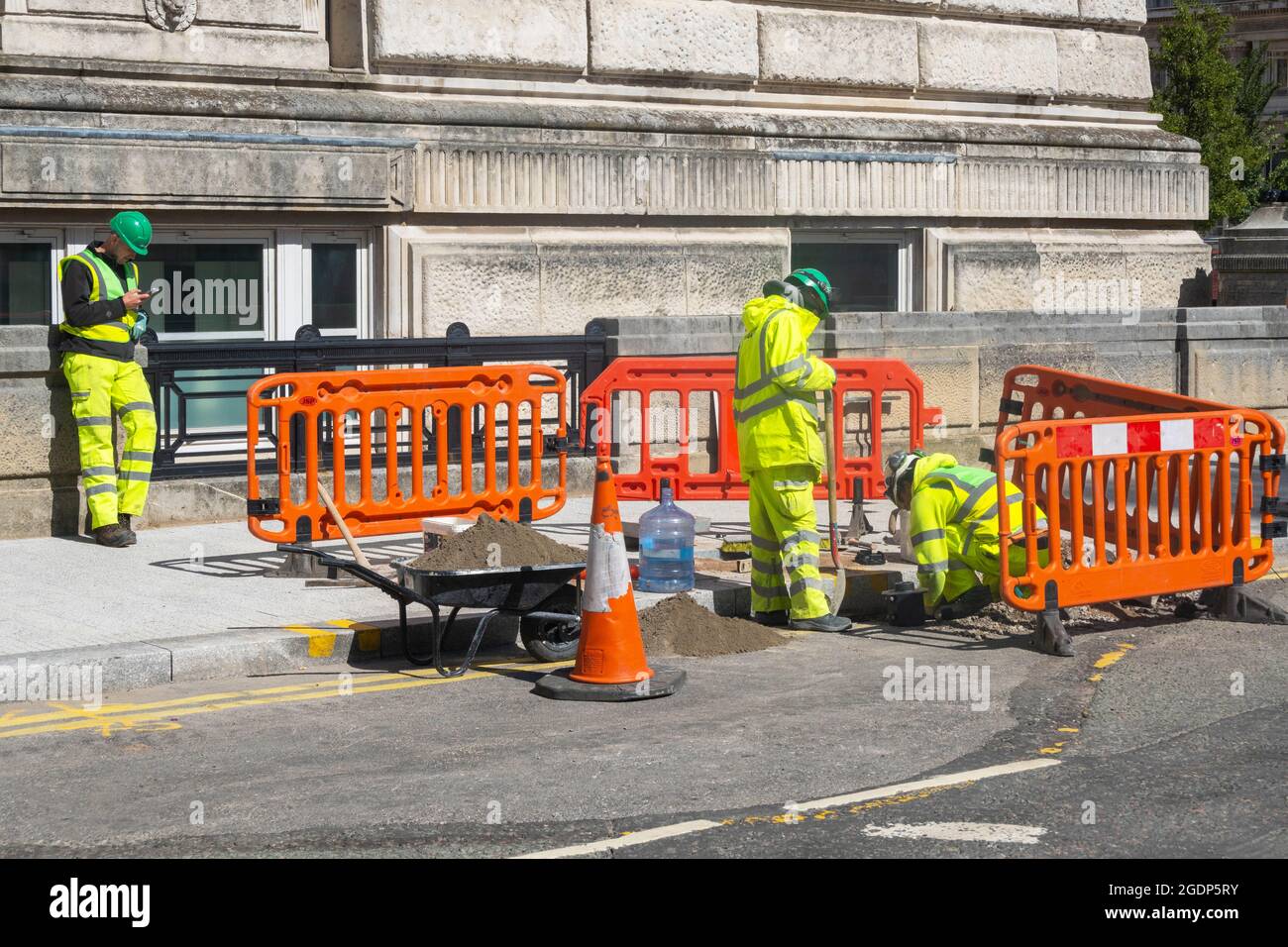 Workers repairing the Liverpool infrastructure Stock Photo - Alamy