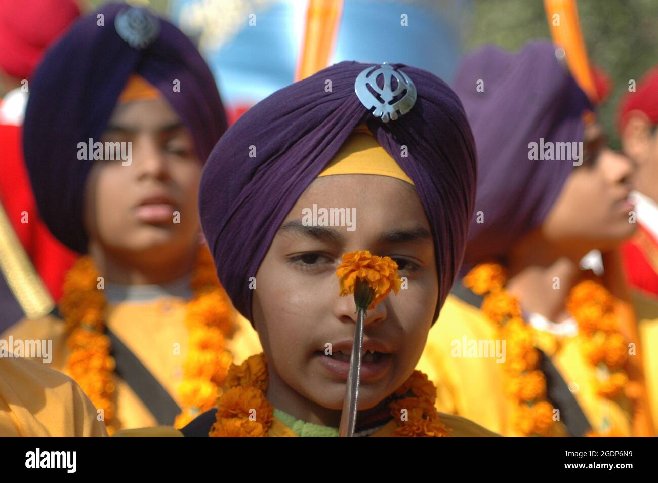 School children dressed in sikh traditional attire participate in a ...