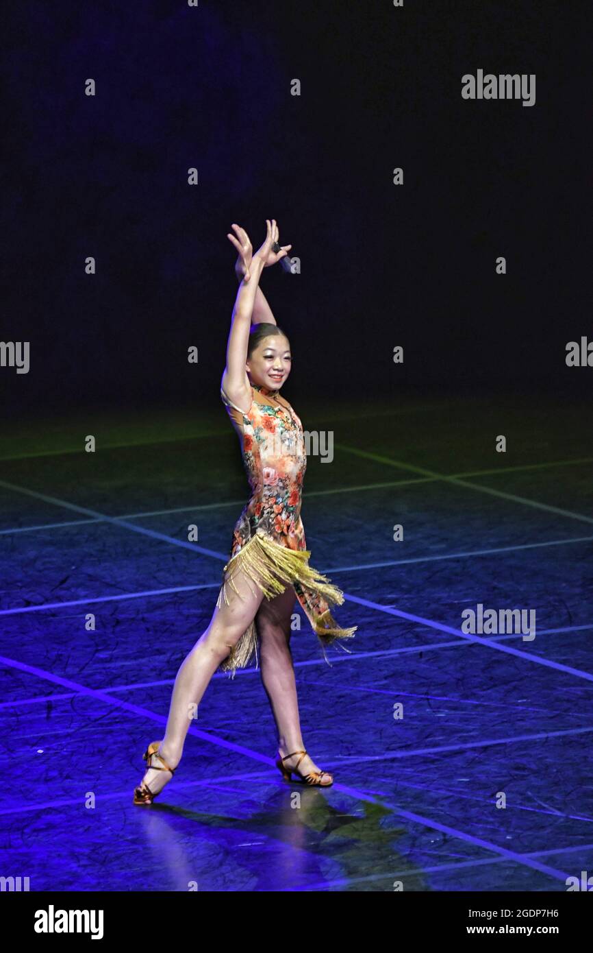 BUSAN, KOREA, SOUTH - Jun 26, 2019: A dancer in a costume performing on ...