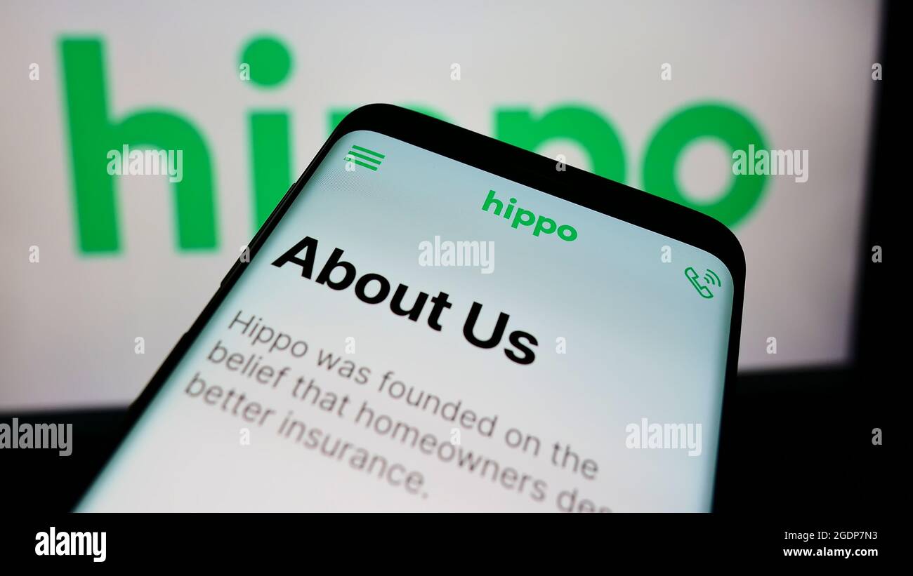 Cellphone with webpage of American insurance company Hippo Holdings Inc ...