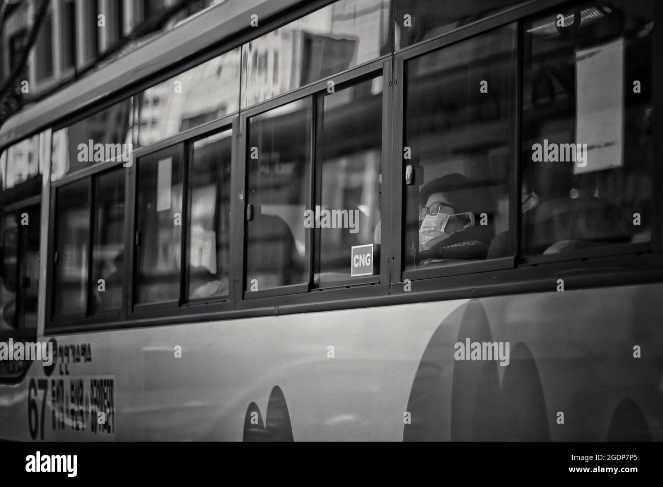 Grayscale shot of people on the public bus in Busan, South Korea Stock ...