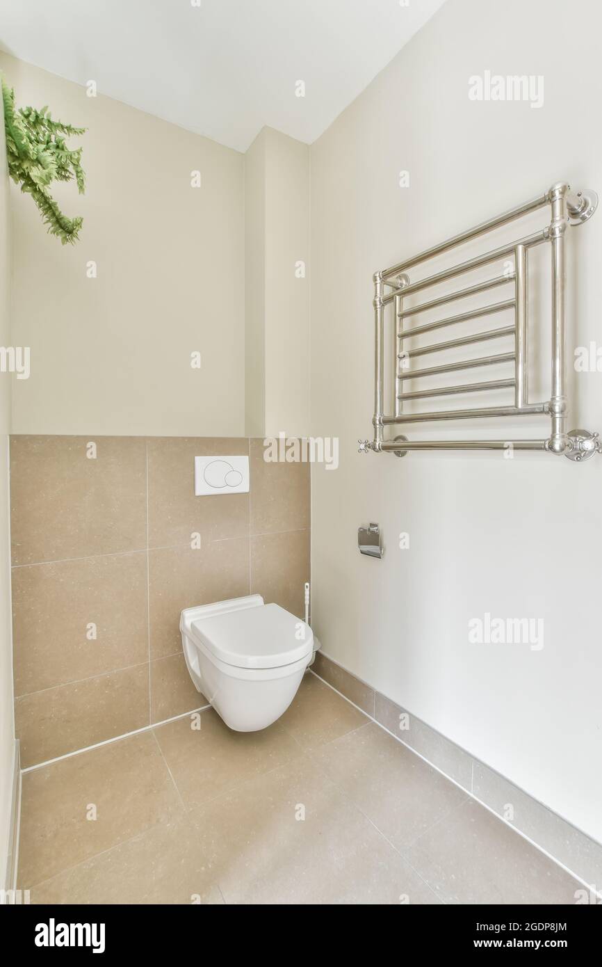 Interior of small clean washroom in miniature style Stock Photo - Alamy