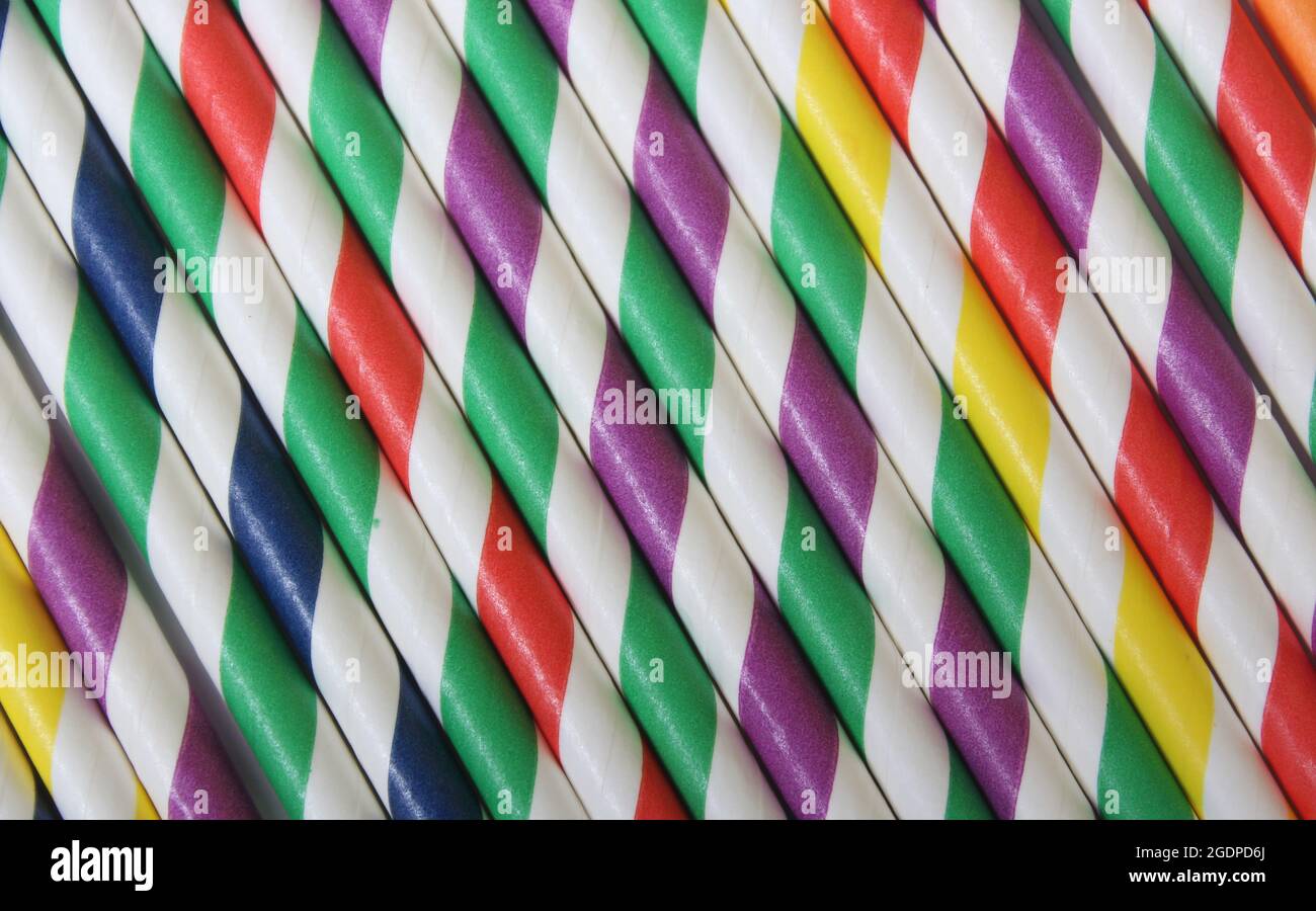 Colorful Striped Paper Straws Background Stock Photo - Alamy