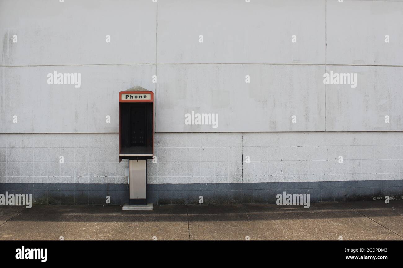 Broken Phone Booth on Wall of Abandoned Building Stock Photo - Alamy