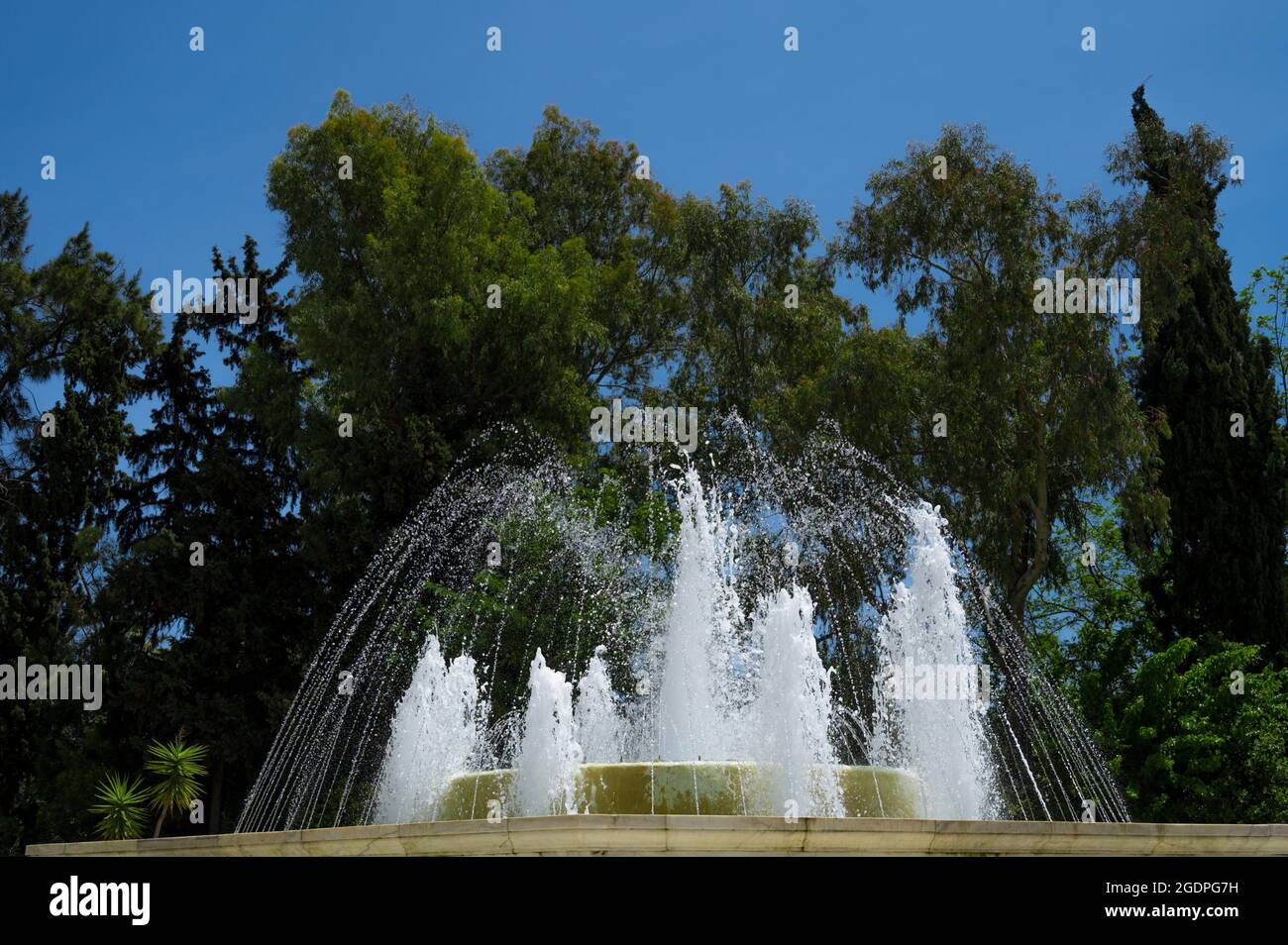 A fountain in city park on a hot summer day. Fresh cool water Stock ...