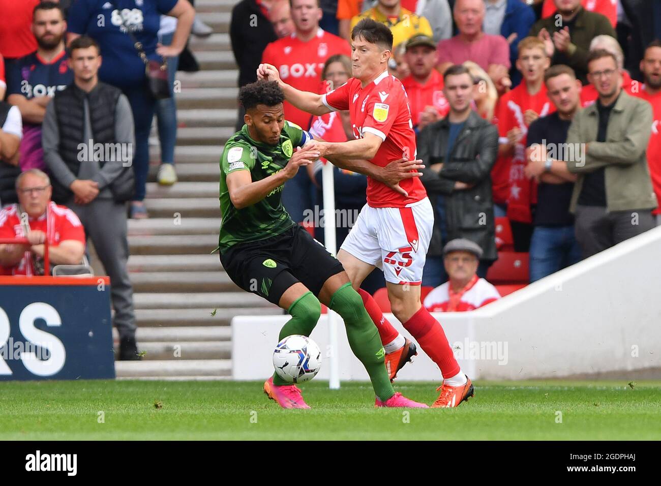NOTTINGHAM, UK, AUG 14TH Lloyd Kelly of AFC Bournemouth tackles Joe ...