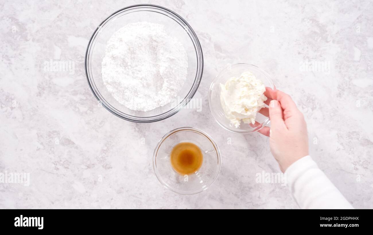 Flat lay. Step by step. Ingredients in a glass mixing bowl to prepare ...