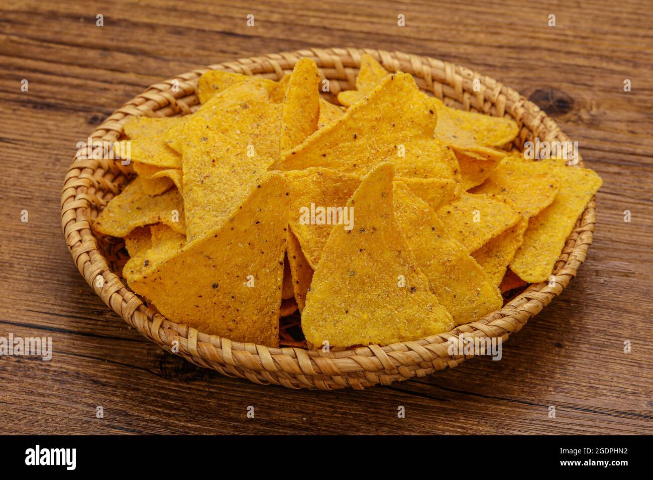 Mexican crunchy corn nachos triangle heap Stock Photo - Alamy