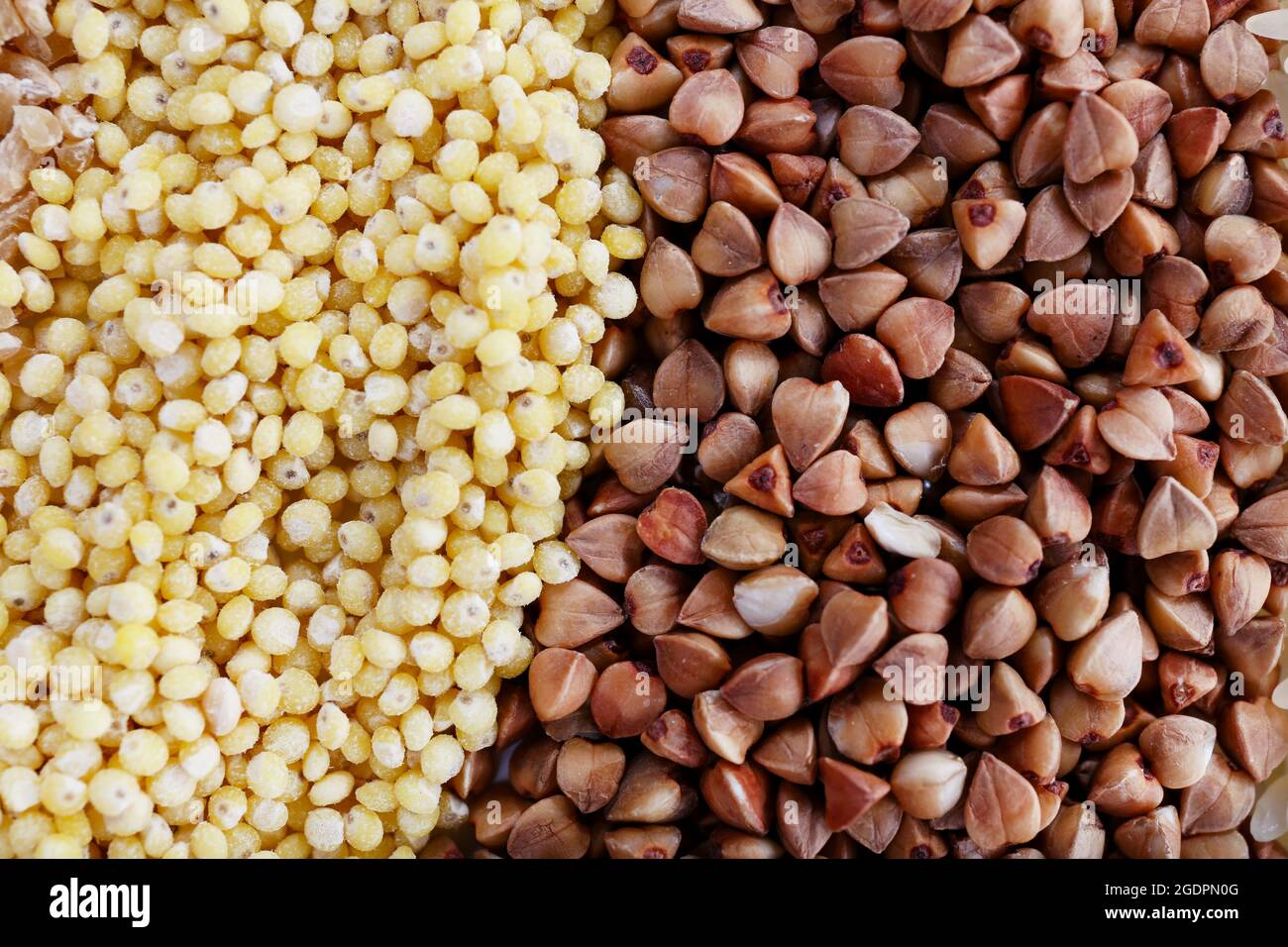 Millet and buckwheat as background Stock Photo - Alamy