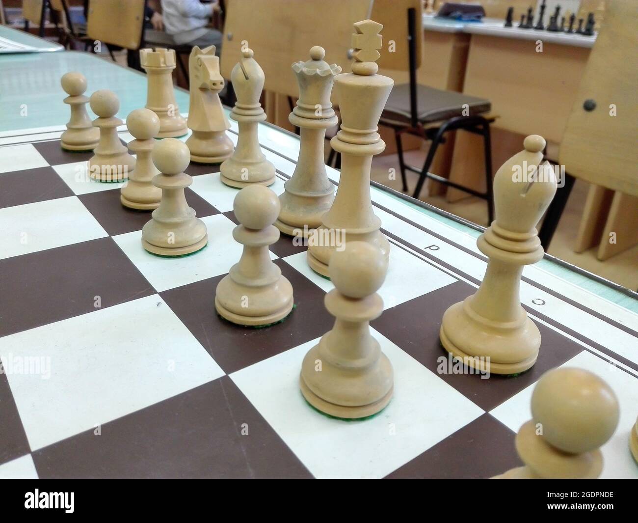 Figurines on chessboard hi-res stock photography and images - Alamy