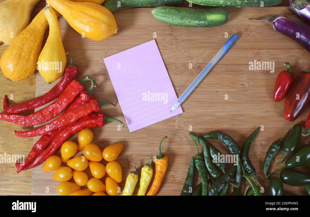 Organic Summer Vegetable Harvest on Table With Note Pape and Pen Stock ...